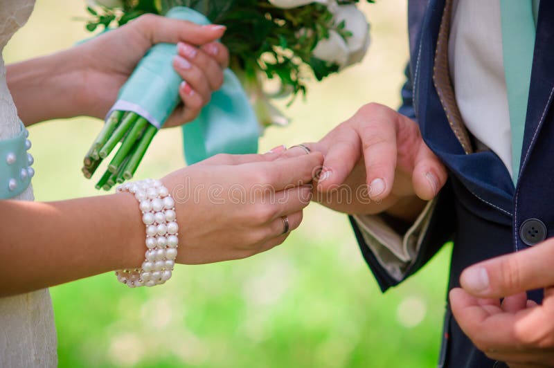 Hands of Bride and Groom with Rings Stock Image - Image of hands ...