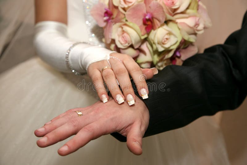Hands of the Bride and Groom Together Stock Photo - Image of finger ...