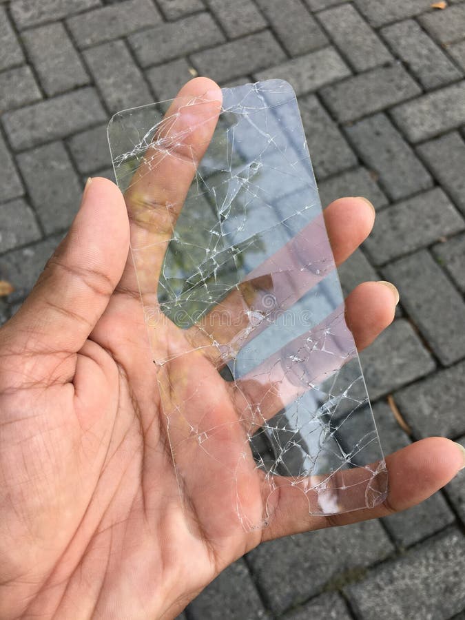 Broken Tempered Glass Screen Protector Removed from Smartphone ...
