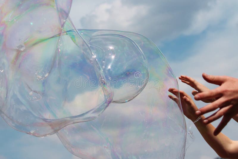 Bubble Hands and Bubbles Against the Sky Stock Photo - Image of ...