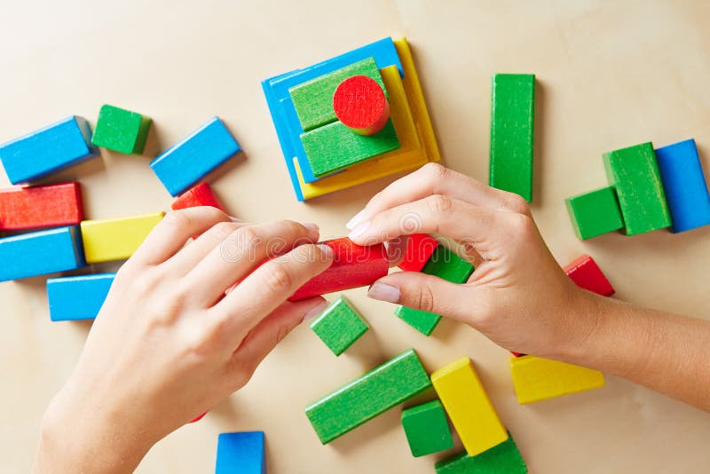 Hands Building Tower with Building Blocks Stock Photo - Image of stones ...