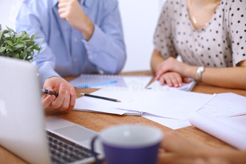 Hands of Business People Meeting Around Table Stock Photo - Image of ...
