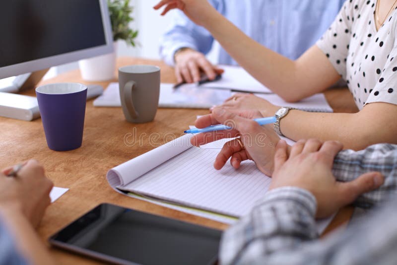 Hands of Business People Meeting Around Table Stock Image - Image of ...