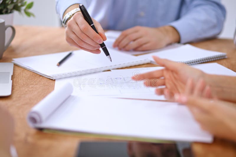 Hands of Business People Meeting Around Table Stock Image - Image of ...