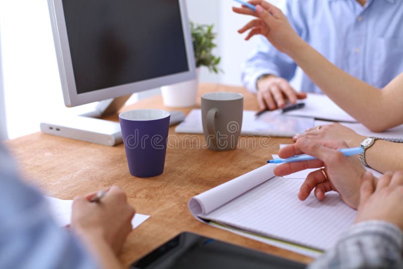 Hands of Business People Meeting Around Table Stock Photo - Image of ...