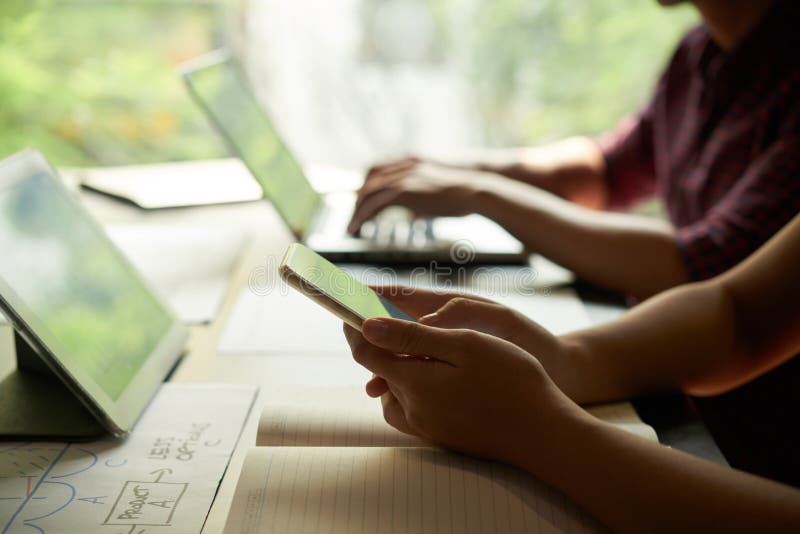 Checking text messages stock photo. Image of marketing - 107711698