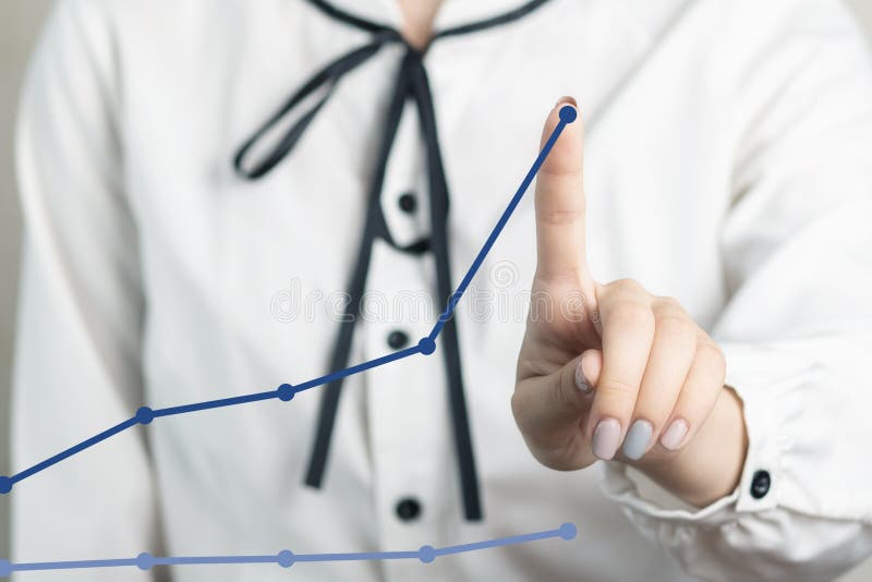 Hands of a Businessman Indicate a Graph of Increasing Profits and Sales ...
