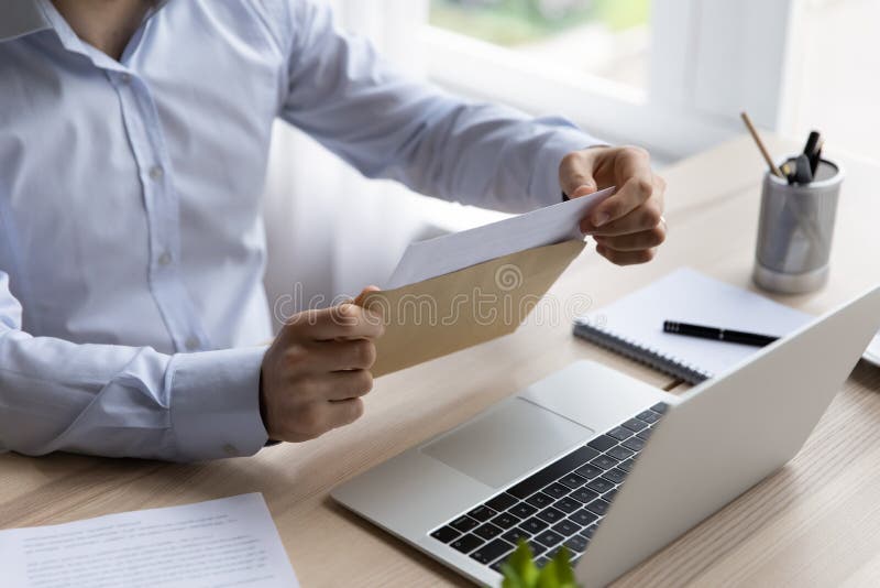 Hands of Businessman Opening Envelope with White Paper Stock Image ...