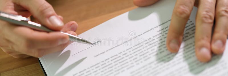 Hands of Businessman with Pen Signing Contract Document at Table ...
