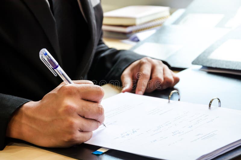 African Businessman Signing Documents Stock Photo - Image of closeup ...