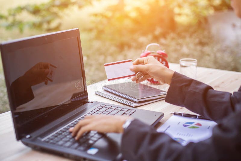 Hands of Businessman Working on Laptop Computer with Data Charts Stock ...