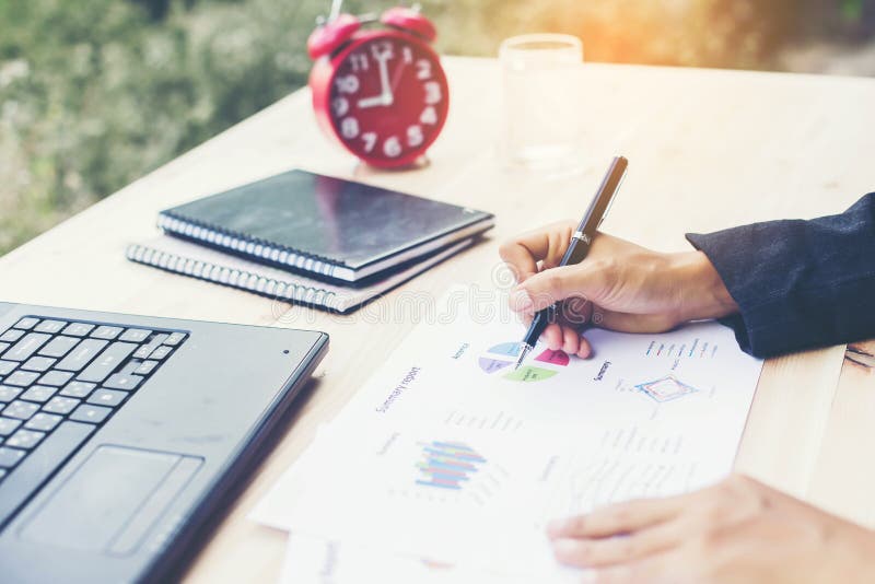 Hands of Businessman Working on Laptop Computer with Data Charts Stock ...