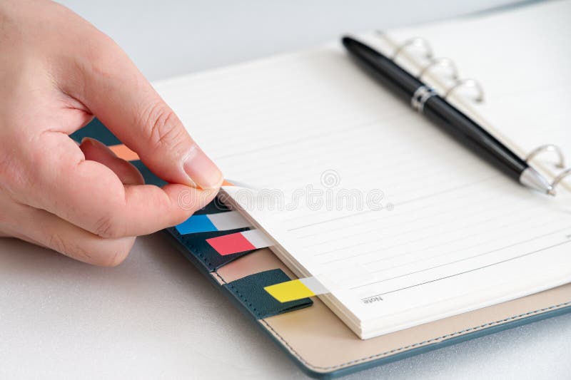 Hands of a Businessman Writing a Schedule or Recording Ideas in a Diary ...