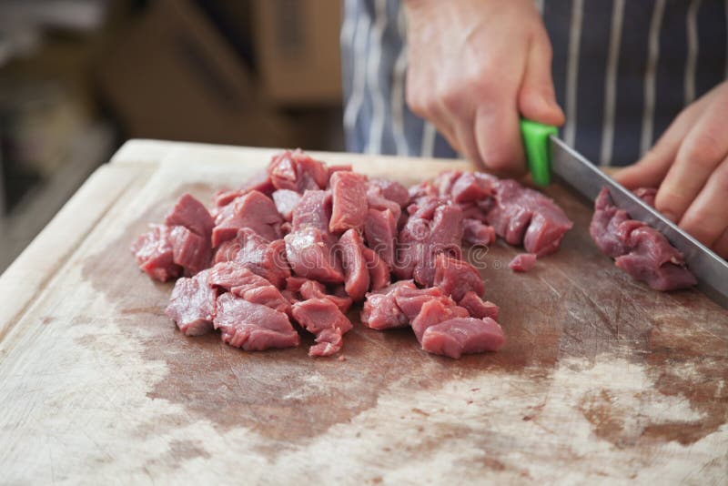Hands of Butcher Cutting Meat by Knife Stock Photo - Image of person ...