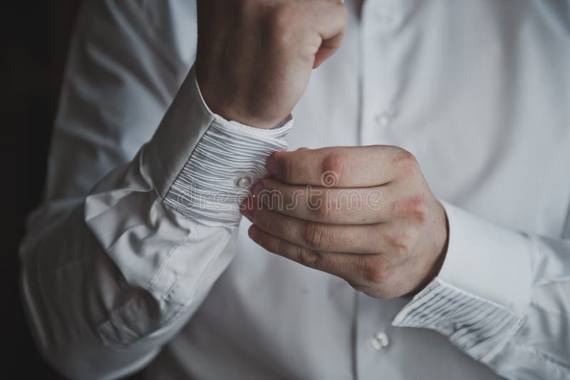 Hands Button Up the Buttons on His Shirt 7870. Stock Image - Image of ...