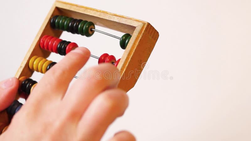 Hands calculate on abacus stock video. Video of education - 55563371