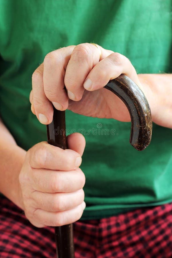 Hands and cane stock image. Image of vertical, closeup - 31373473