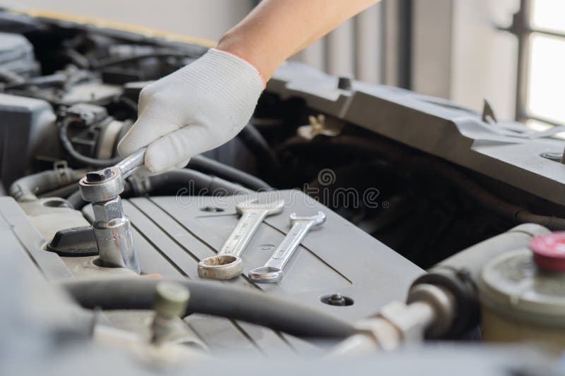 Hands of Car Mechanic in Auto Repair Service. Auto Mechanic Working in ...