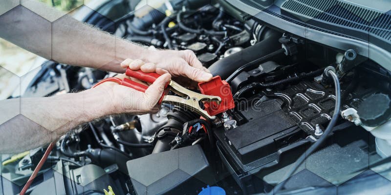 Hands of Car Mechanic Using Car Battery Jumper Cable, Geometric Pattern ...