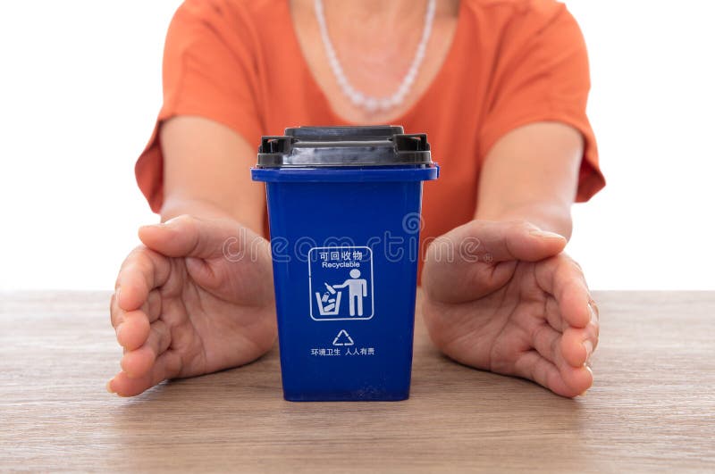 Hands Care of the Red Hazardous Garbage Trash Can Model Expresses the ...