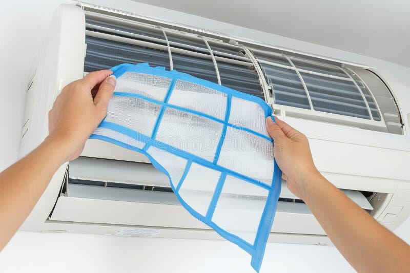 A Person Diligently Cleaning an Air Conditioning Filter To Ensure ...