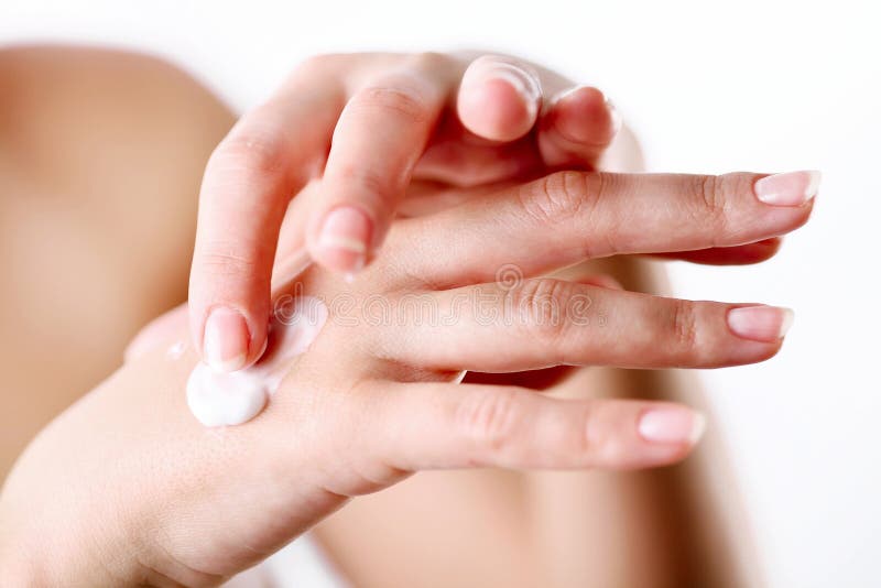 Woman Applying Cream on Her Hands Stock Photo - Image of cream, beauty ...