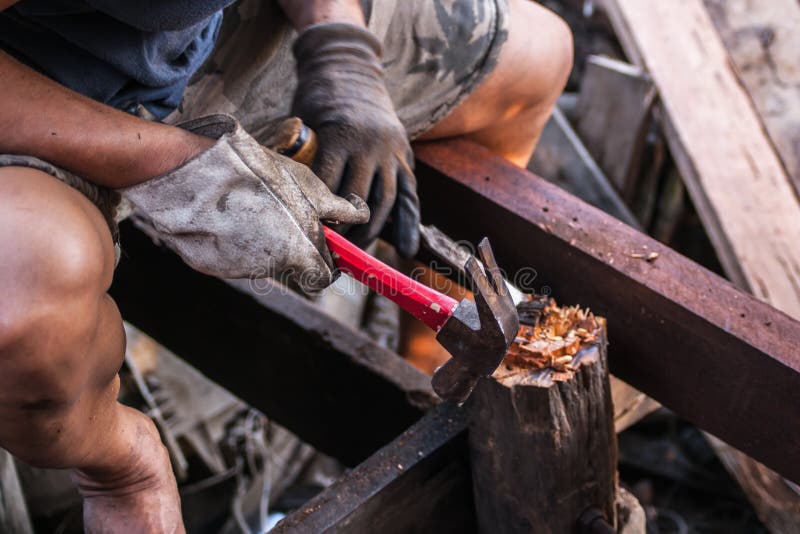 Hands of Carpenter with Chisel and Hammer in the Hands Stock Image ...