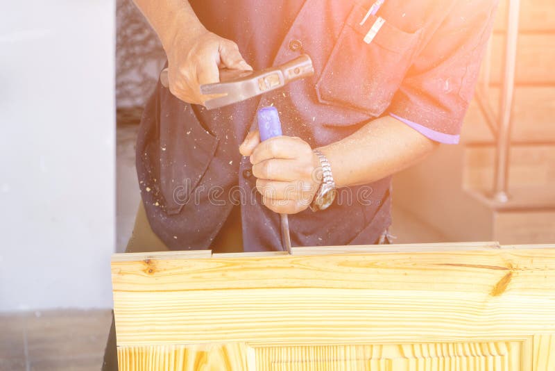 Hands of Carpenter with Chisel in the Hands Stock Photo - Image of ...