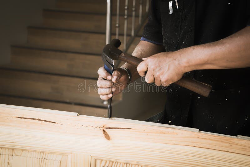 Hands of Carpenter with Chisel in the Hands Stock Photo - Image of ...