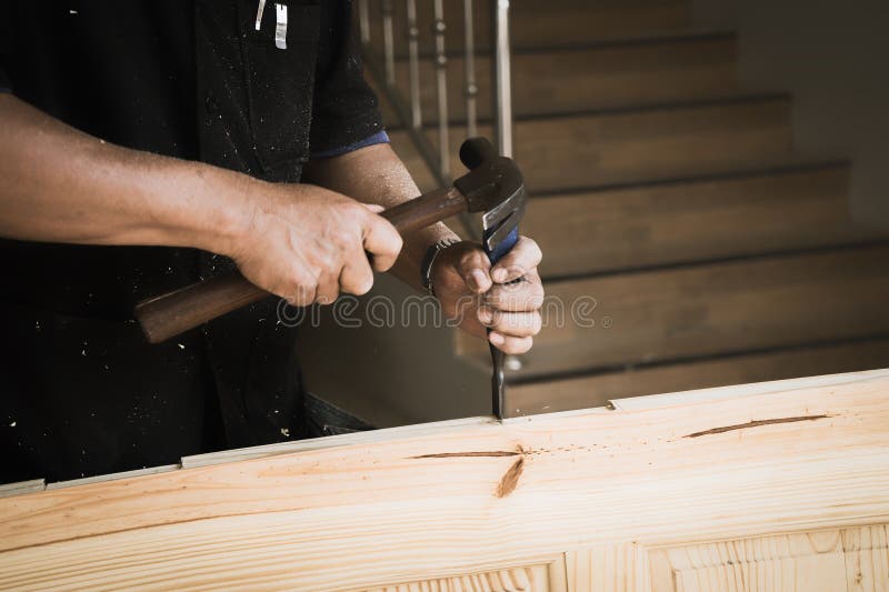 Hands of Carpenter with Chisel in the Hands Stock Photo - Image of ...