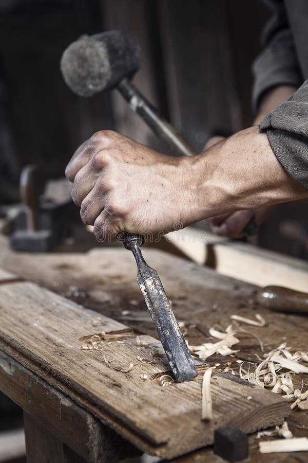 Hands of Carpenter with Chisel in the Hands Stock Image - Image of ...