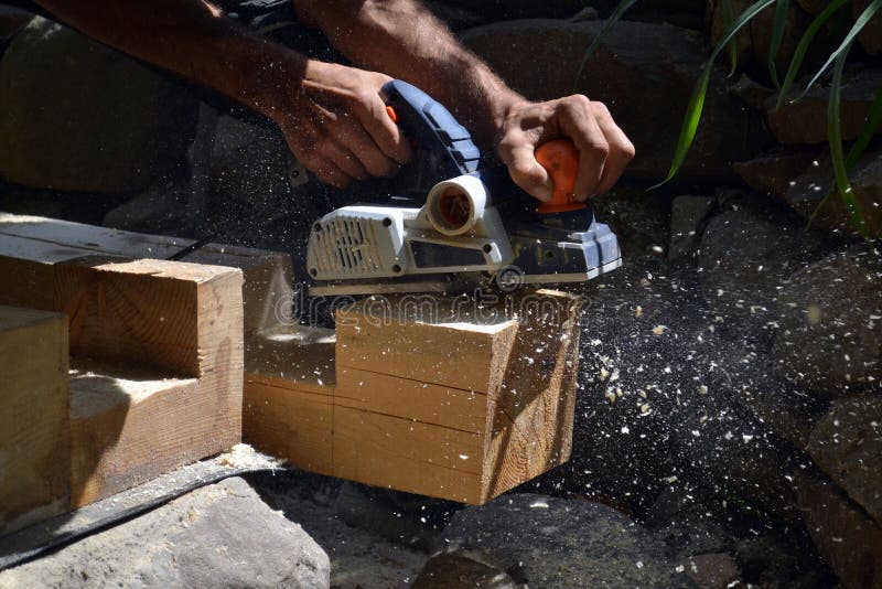 Carpenter Working with Electric Planer Tool Stock Image - Image of ...