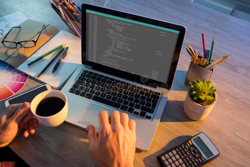 Hands of Caucasian Male Programmer Sitting at Desk and Using Laptop with Coding on Screen Stock ...
