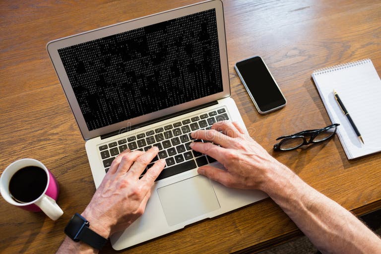 Hands of Caucasian Male Programmer Sitting at Desk, Using Laptop with Coding on Screen Stock ...