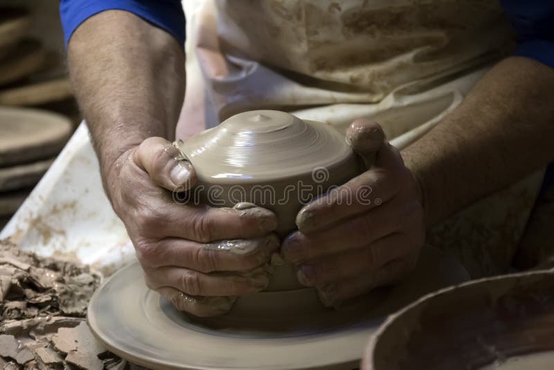 Hands of Ceramic Artist Making a Piece Stock Image - Image of spin ...