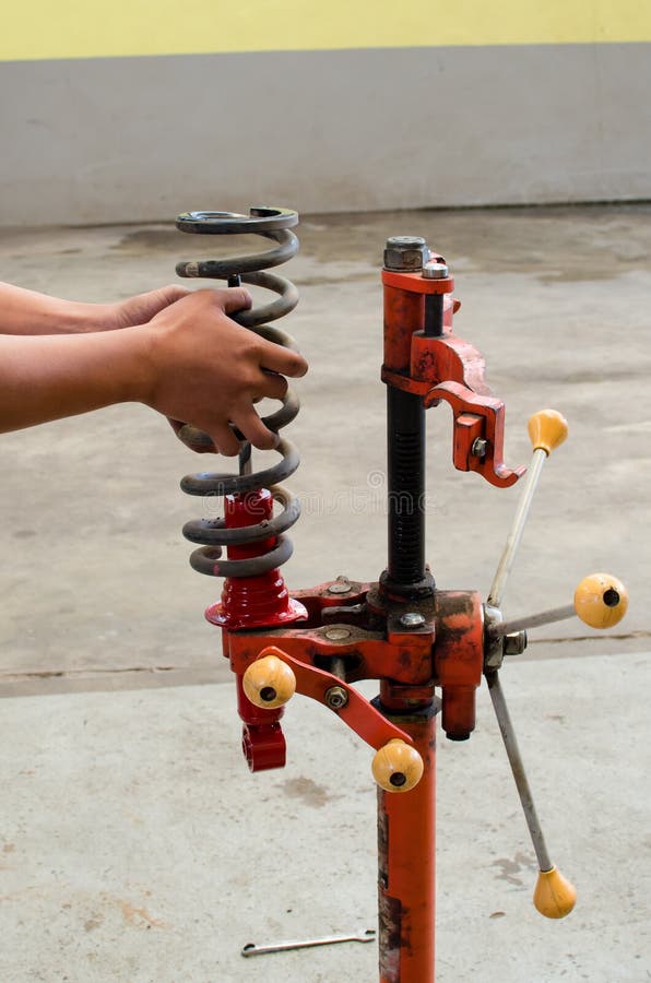 Hands Changing Shock Up Absorber Stock Image - Image of male, machine ...