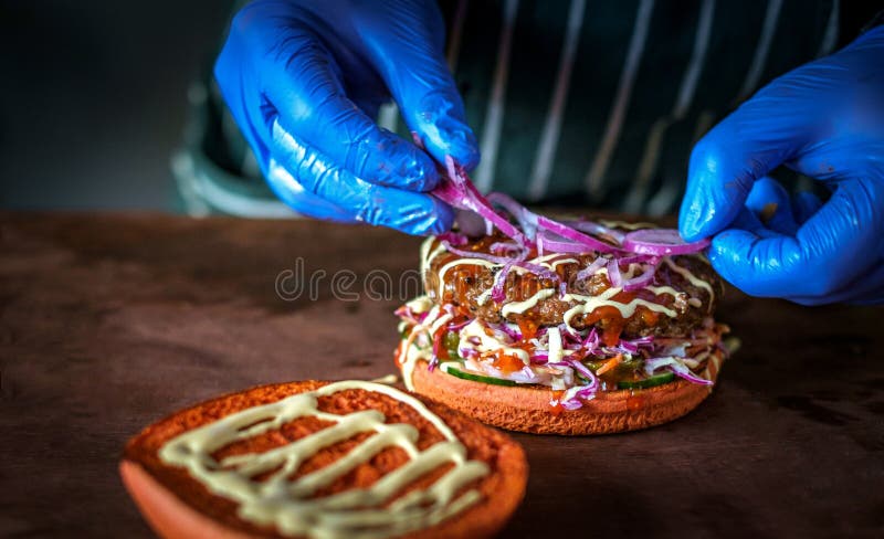 The Hands of the Chef, Make a Burger Stock Image - Image of burger ...