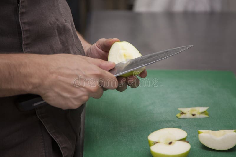 Hands of a Chef Cutting an Apple Stock Image - Image of breakfast ...