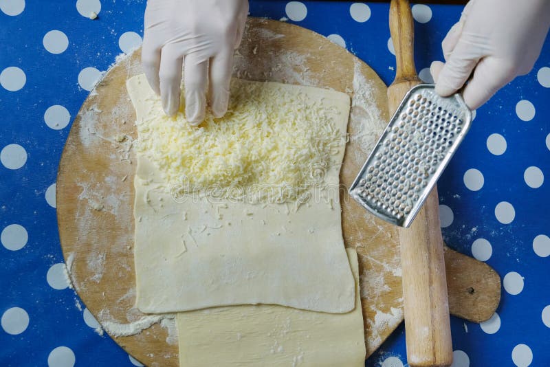 Hands of a Chef Grating Cheese Stock Photo - Image of cheese, hands ...