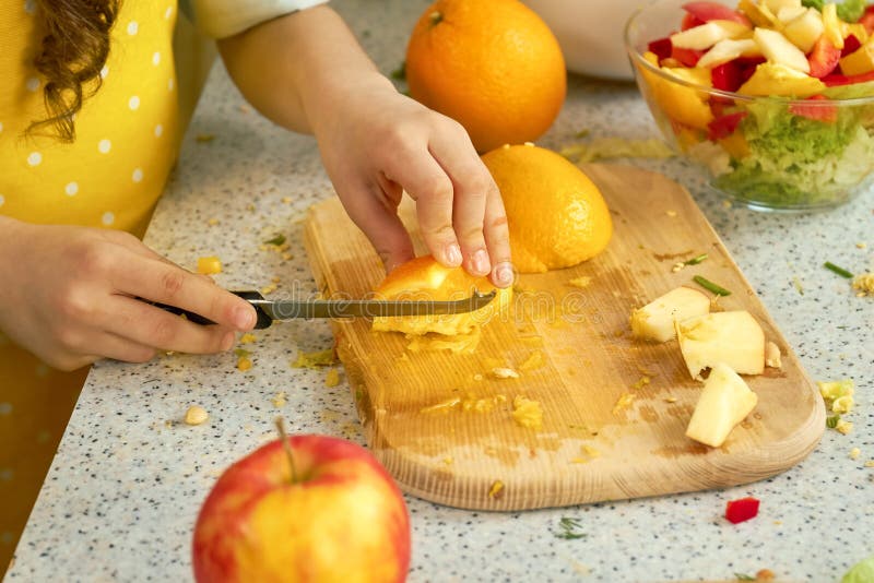 Hands of Child Cutting Orange. Stock Photo - Image of ingredient, chef ...