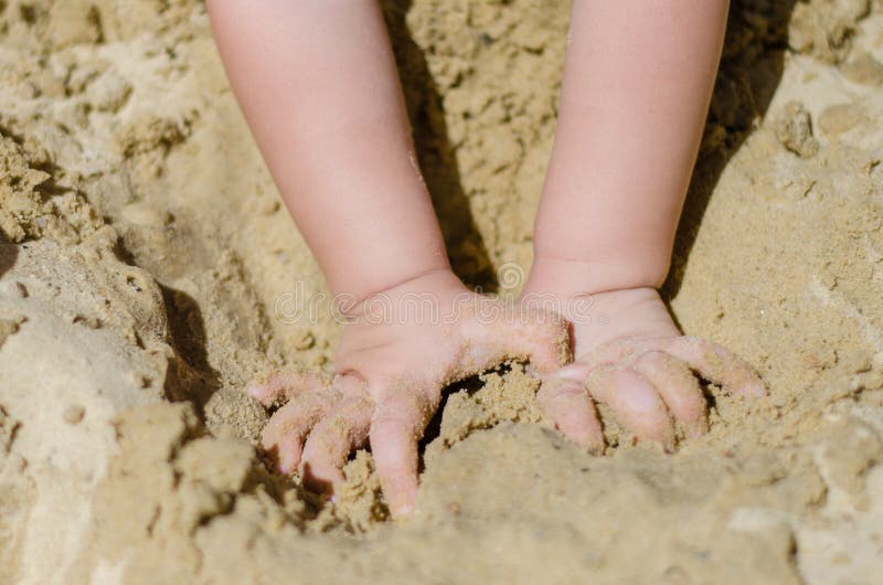 The Child is Digging in the Sandbox Stock Photo - Image of funny, hands ...