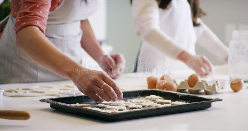Hands of Child, Mother and Baking Cookies in Kitchen with Teaching ...