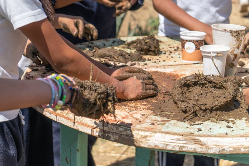 Hands of Children Playing with Mud, Ecological Construction Stock Photo ...