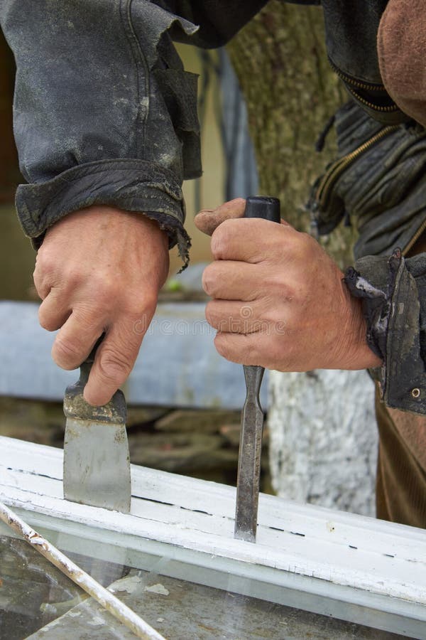 Hands with a Chisel,old Wrinkled Hands Work a Chisel on a Tree Stock ...