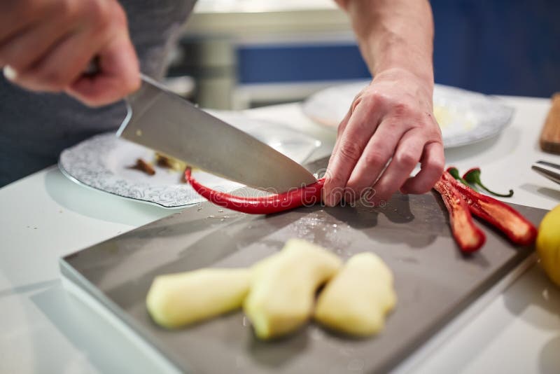 Hands chopping chili stock photo. Image of lunch, hands - 68308980