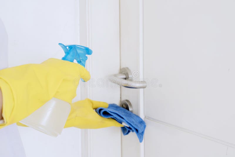 Hands Cleaning Door Handle with Disinfectant Spray Stock Image - Image ... Hands Cleaning Door Handle with Disinfectant Spray Stock Image - Image ...