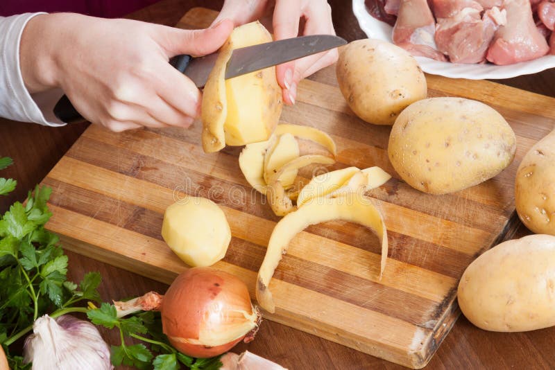 Cleaning potatoes stock photo. Image of clean, starch - 27860004