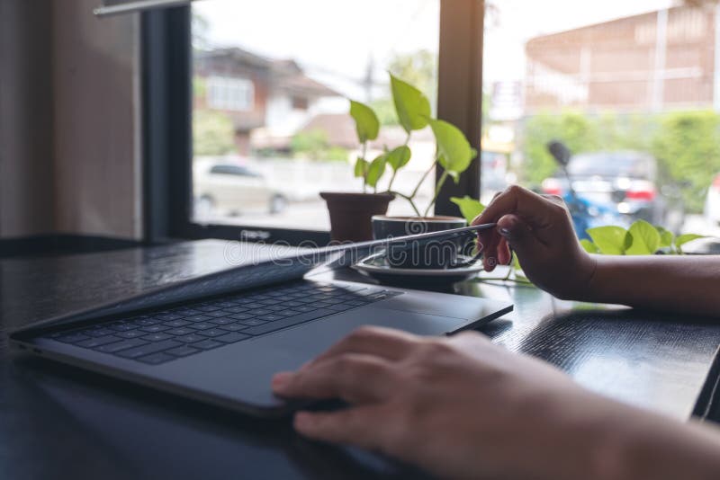 Hands Close and Open a Laptop Computer on Table after Finished Using it ...