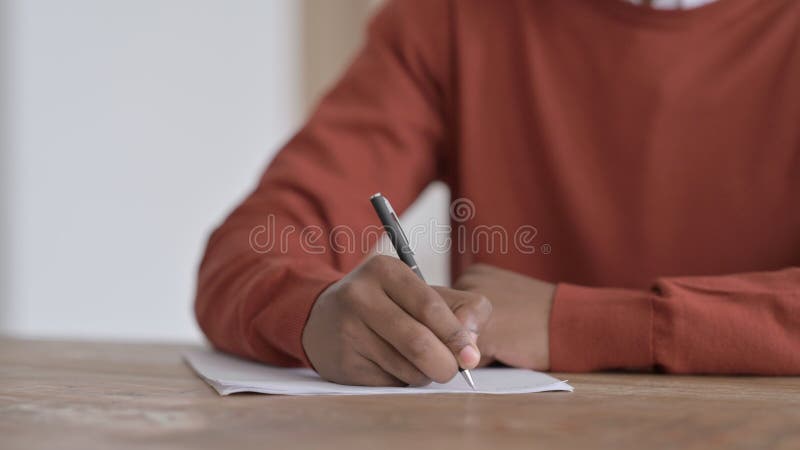 Hands Close Up of African Man Writing on Paper Stock Photo - Image of ...