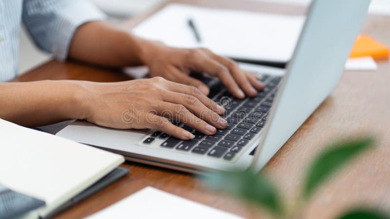 Hands Close Up Freelancer Busy Working on a Laptop Computer on Desktop ...